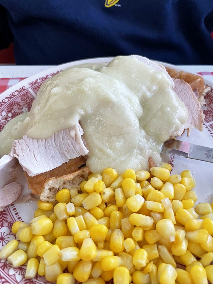 Turkey croquettes smothered in gravy with a side of sweet corn&mdash;like Thanksgiving decided to visit on a random Tuesday.