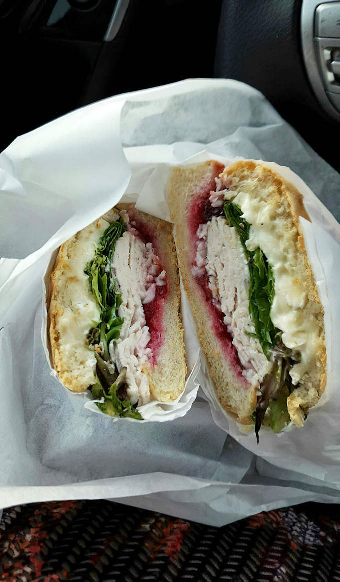 This sandwich has that rare "car-worthy" quality—the kind you carefully balance on your lap while driving, willing to risk upholstery for one more bite.
