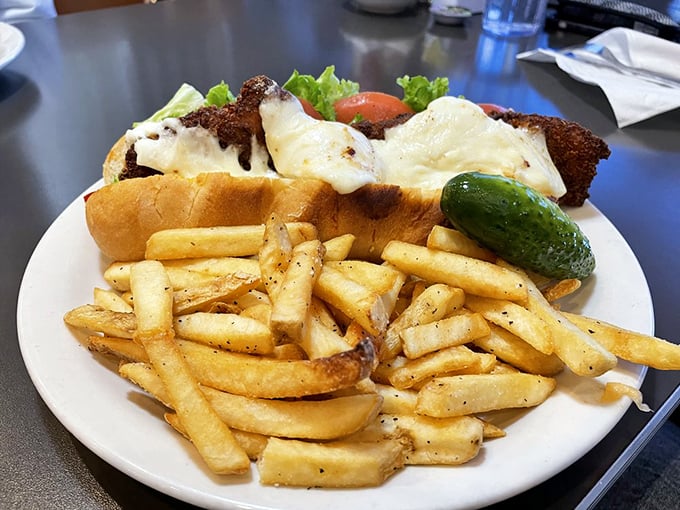 This sandwich isn't just a meal, it's an engineering marvel&mdash;crispy chicken, melty cheese, and golden fries that deserve their own spotlight.