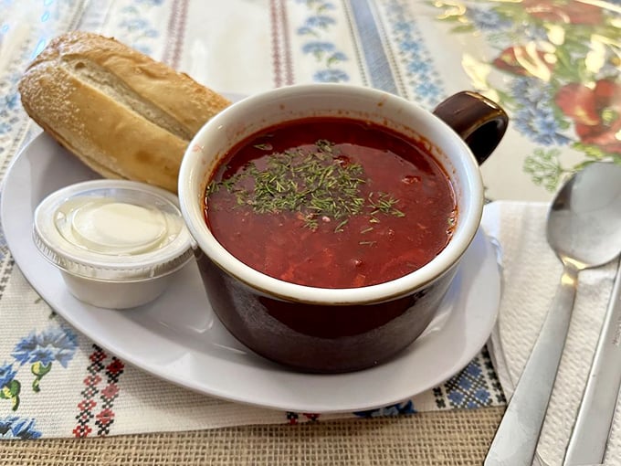 Borscht so vibrant it could double as modern art, topped with fresh dill and served with bread that's begging to be dunked.