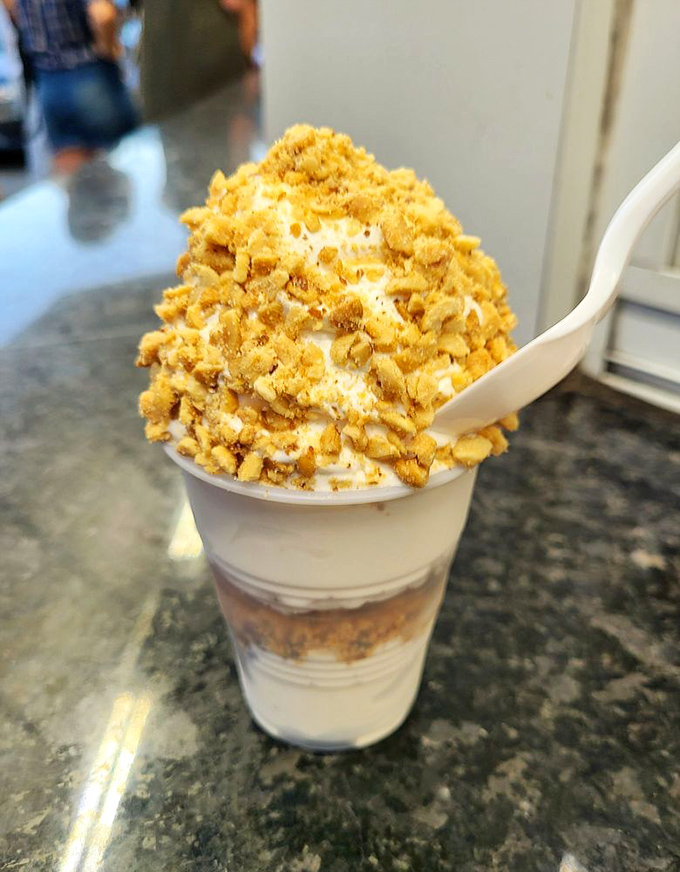 Vanilla custard crowned with crushed peanuts&mdash;a textural masterpiece that makes you question why you'd eat dessert any other way.