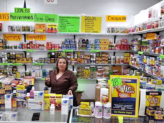 Behind every great market stall is a knowledgeable vendor. This herbal and supplement booth offers remedies organized by ailment with colorful precision.