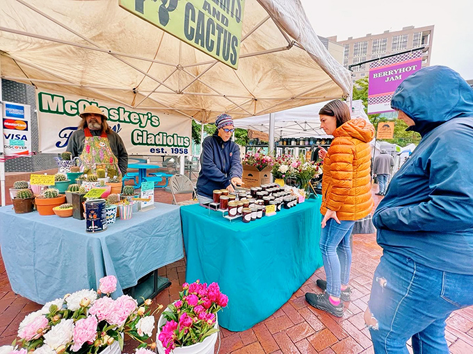 McCloskey's flower stand brings a riot of color to rainy market days, proving that even in drizzle, Idaho's growing season shows up in style.