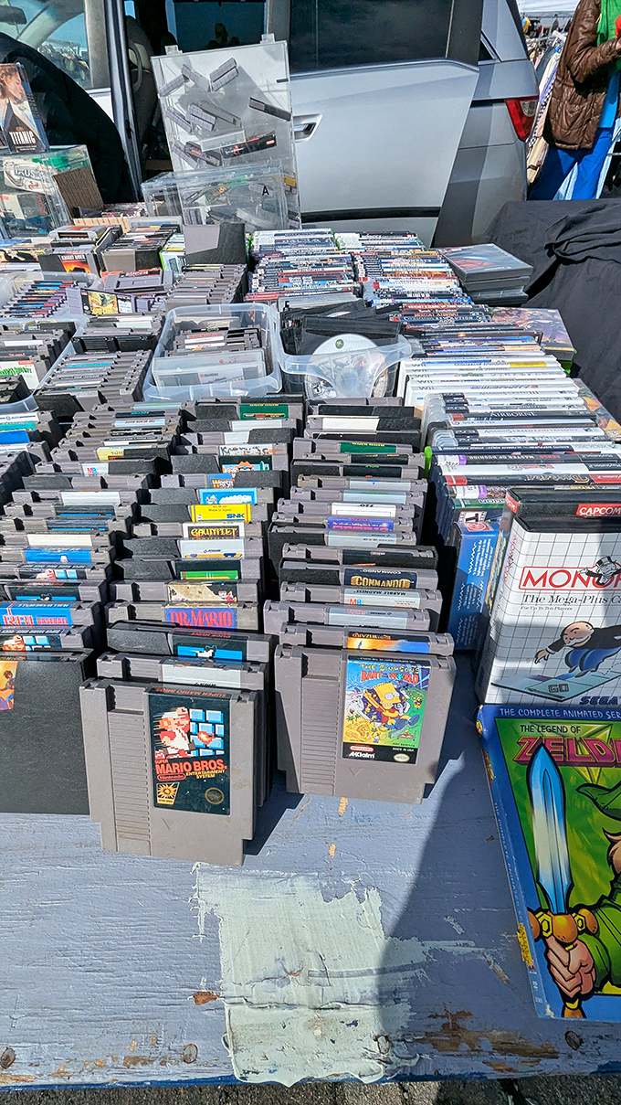 Gaming history stacked in plastic cartridges. Every vintage Nintendo game represents countless hours of childhood joy and parental frustration.