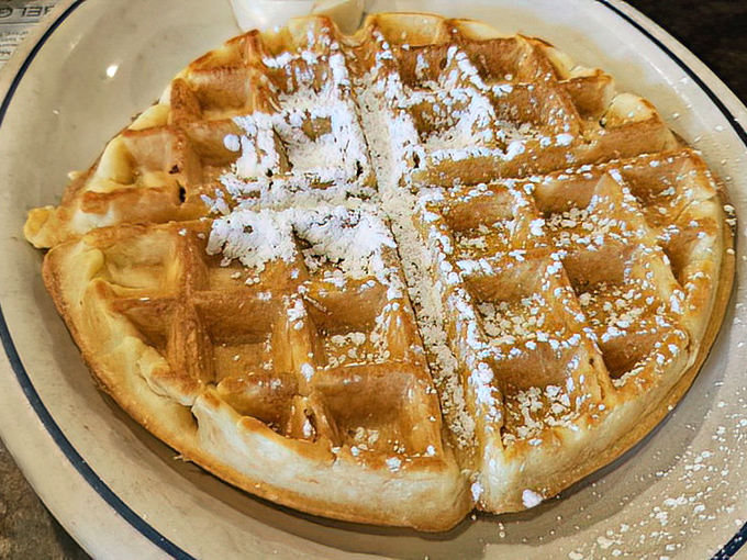 This Belgian waffle doesn't need fancy toppings to shine. Dusted with powdered sugar, it's the breakfast equivalent of a perfect little black dress.