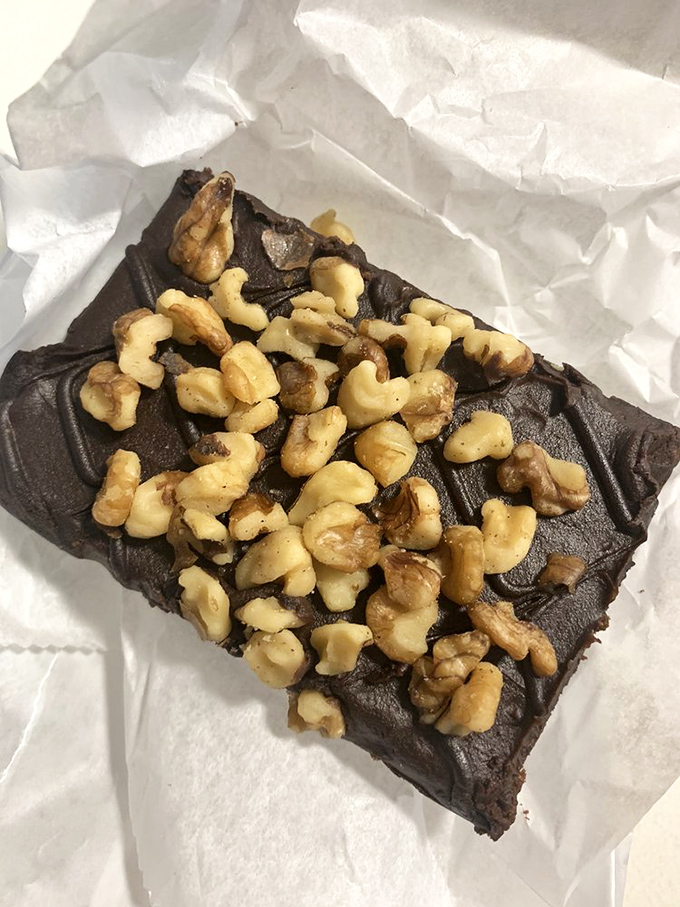 Walnuts standing guard over chocolate like loyal sentinels. This brownie doesn't just satisfy cravings&mdash;it creates lifelong memories. 