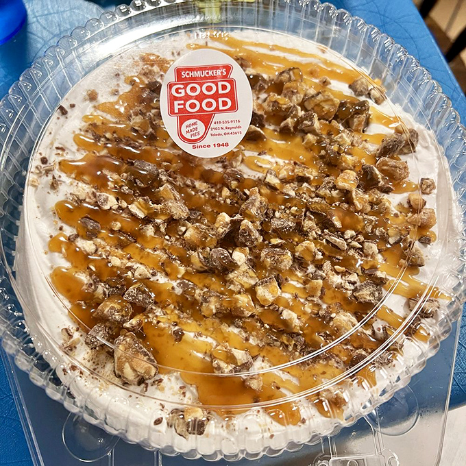 Caramel, whipped cream, and crunchy toppings transform this pie into a dessert that would make your cardiologist wince and your soul sing.