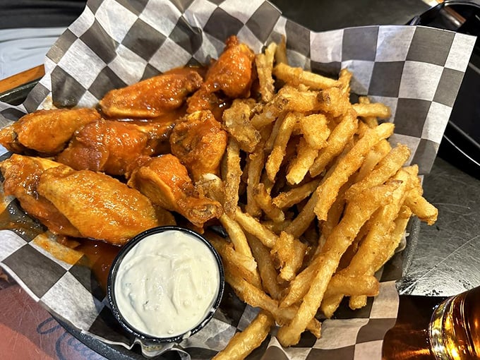 Wings that don't need a Super Bowl excuse to be devoured. Paired with those buttery fries, it's a combo that demands both napkins and respect.