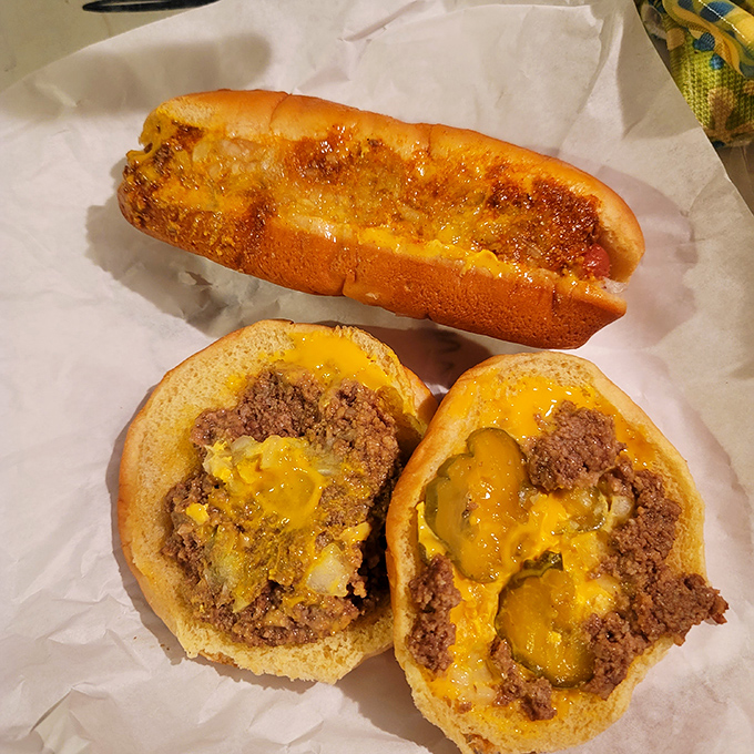 The legendary zip burger in all its glory&mdash;loose meat perfection nestled in a soft bun with melty cheese and pickles playing backup.