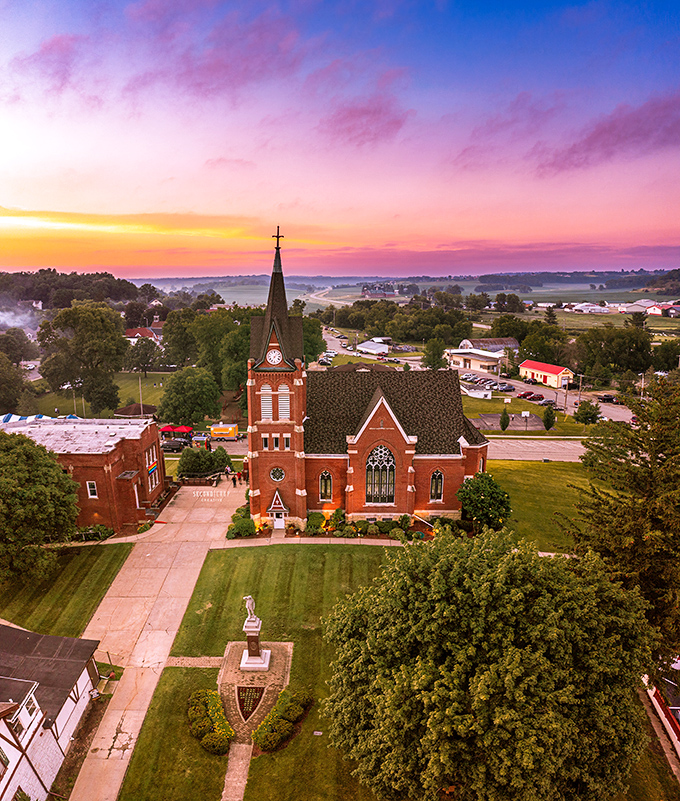 From above, the church anchors New Glarus in a tapestry of rolling Wisconsin countryside, especially magical during the golden hour.
