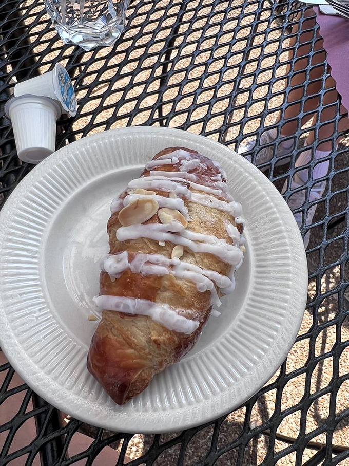 This isn't just a croissant&mdash;it's a buttery, flaky miracle drizzled with icing that makes Monday mornings bearable again.