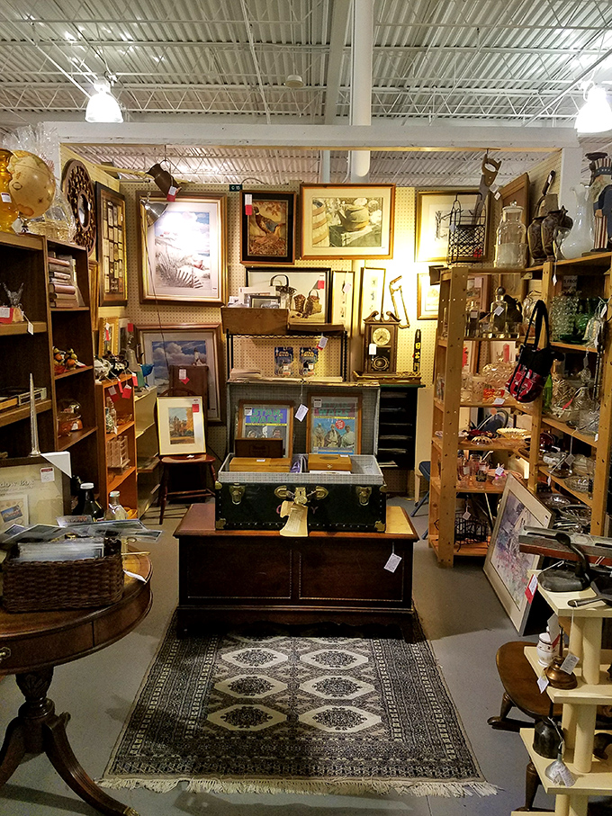 A booth that feels like stepping into a well-loved living room from another era. The framed artwork creates a gallery wall of nostalgia.