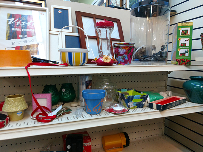 Colorful knickknacks and household items create a kaleidoscope of possibilities. That perfect accent piece is hiding somewhere on these shelves.