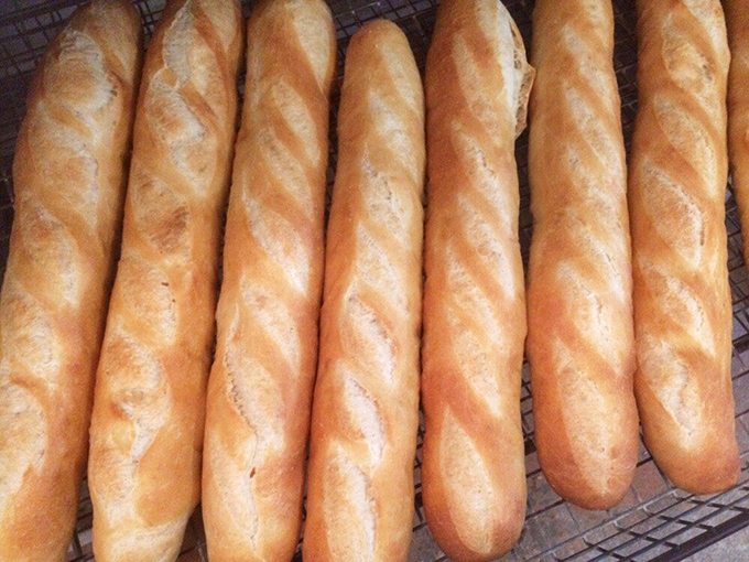 Baguettes with the kind of crust that announces itself with a symphony of crackles. The bread equivalent of a perfect vinyl record.