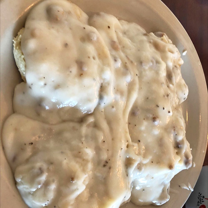 Biscuits and gravy that would make your Southern grandmother nod in approval &ndash; a creamy, peppery blanket of pure comfort.