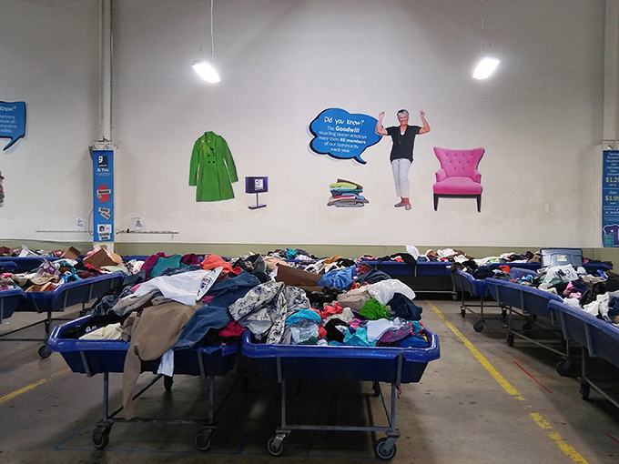 The blue bins - thrifting's version of an all-you-can-eat buffet. Dive in with both hands and emerge victorious with that perfect flannel shirt.