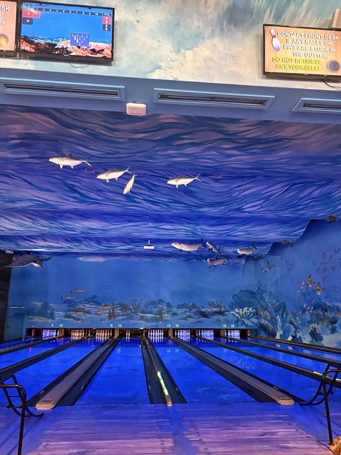 The blue glow of the lanes creates a magical atmosphere. If SpongeBob opened a bowling alley, this would be it.