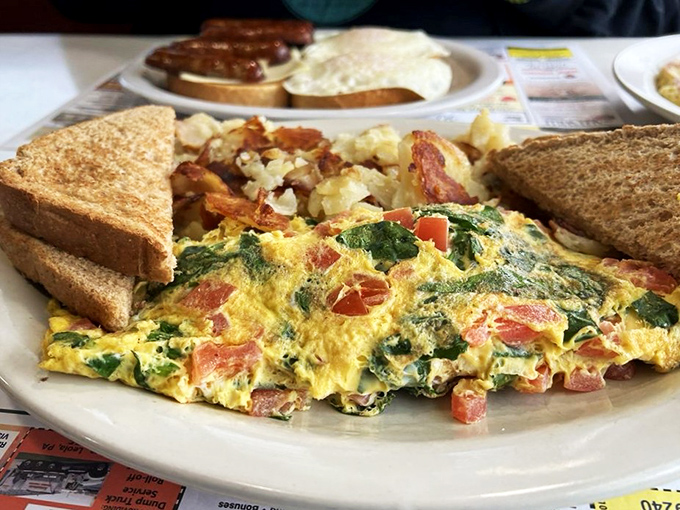 This colorful omelet and home fries combo is the breakfast equivalent of waking up to winning the lottery&mdash;and finding out calories don't count today.