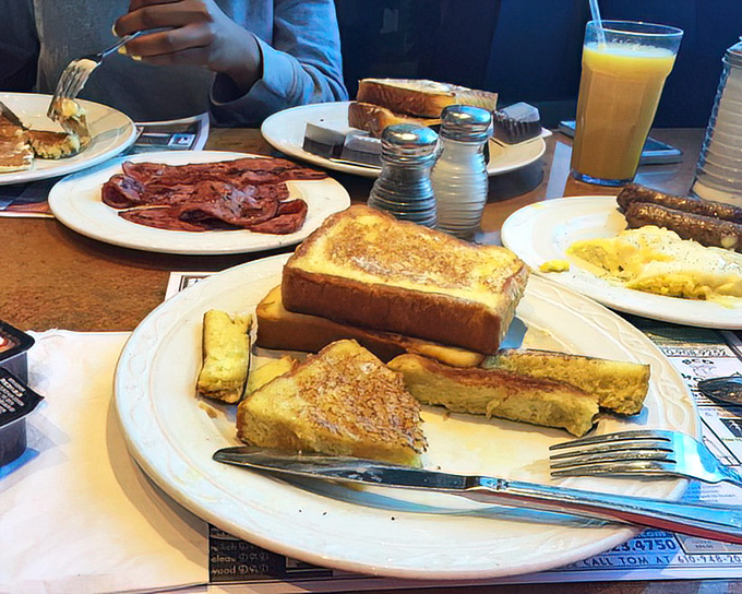 This breakfast spread could feed a Steelers offensive line &ndash; golden French toast and crispy bacon arranged in perfect morning harmony.