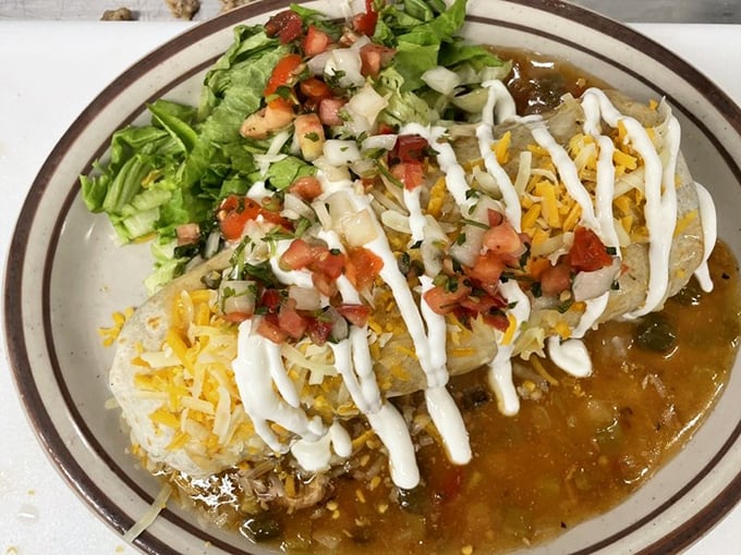This isn't just a burrito&mdash;it's a Colorado statement piece, smothered in green chili with enough cheese to make Wisconsin nervous. 