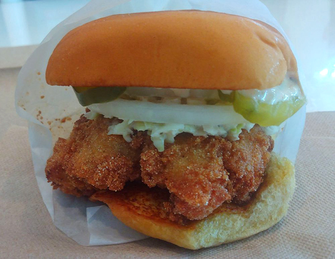 Southern hospitality between two buns&mdash;golden-fried catfish with a crunch you can hear three tables away.