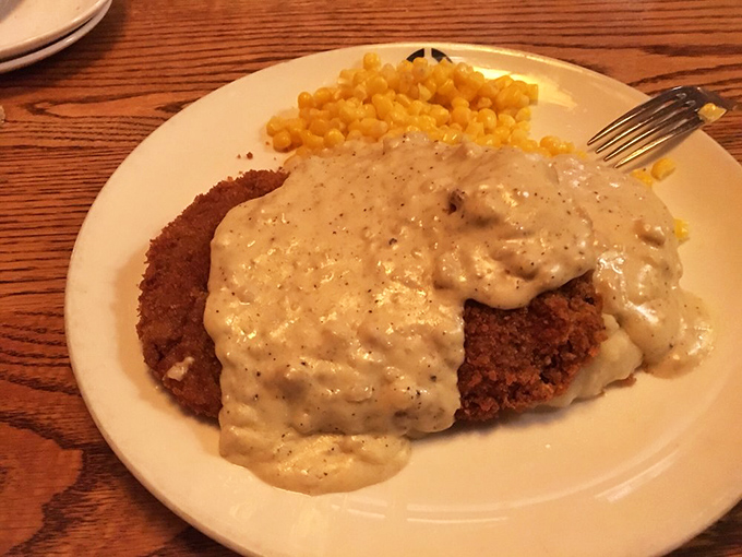 Country comfort on a plate! This chicken fried steak swimming in peppery gravy would make your grandmother simultaneously proud and jealous. 
