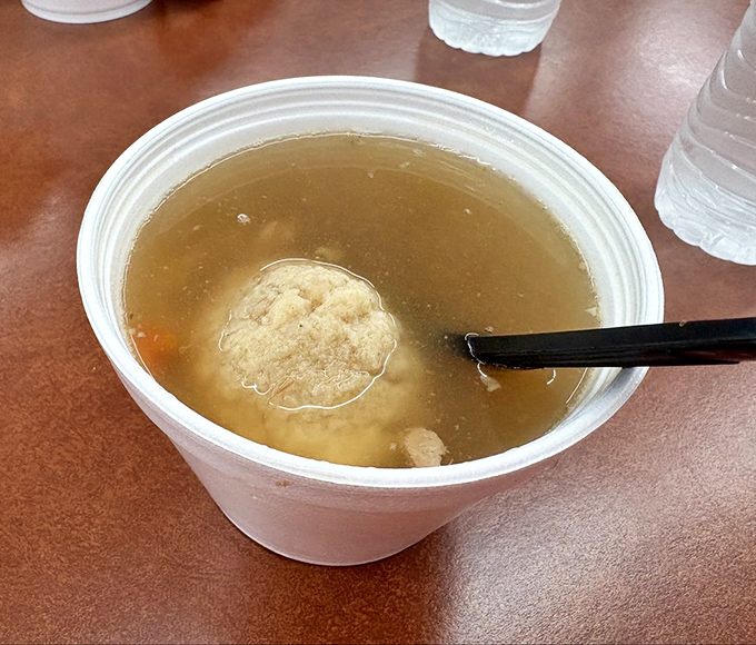 Chicken soup with a matzo ball that floats like a cloud in golden broth. Jewish penicillin that could cure everything from colds to existential crises.