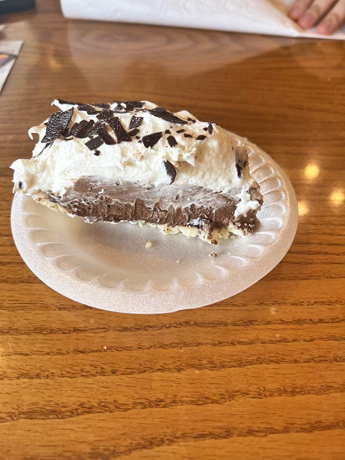 Layer upon heavenly layer of chocolate cream and whipped topping. This slice isn't just dessert &ndash; it's the reason elastic waistbands were invented.
