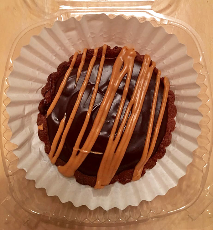 Chocolate tart with caramel drizzle &ndash; proof that British desserts have evolved far beyond spotted dick and bread pudding.