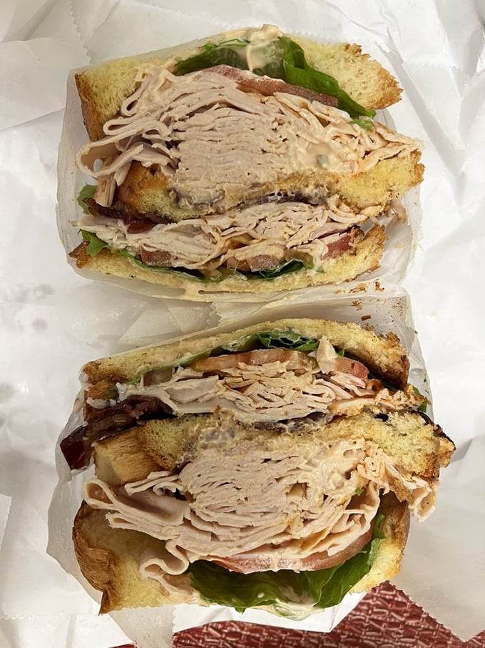 The club sandwich&mdash;three stories of thinly sliced turkey, crisp bacon, and fresh vegetables. A skyscraper of flavor that honors Chicago's architectural heritage.