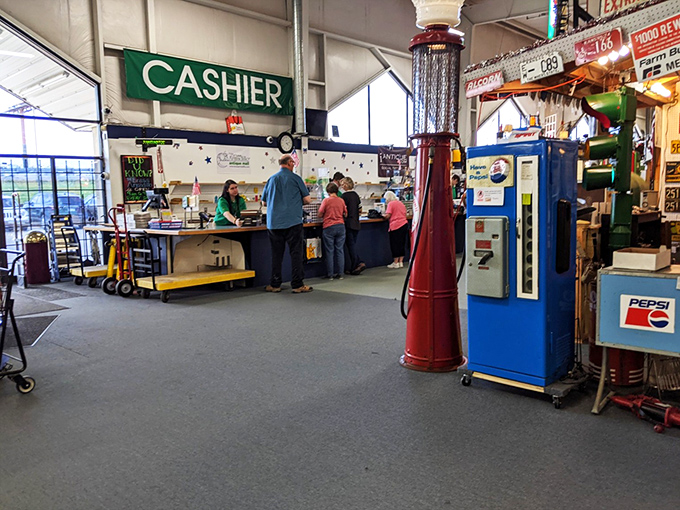 Even the checkout area doubles as a museum, with vintage gas pumps and soda machines reminding us how commerce itself has changed.
