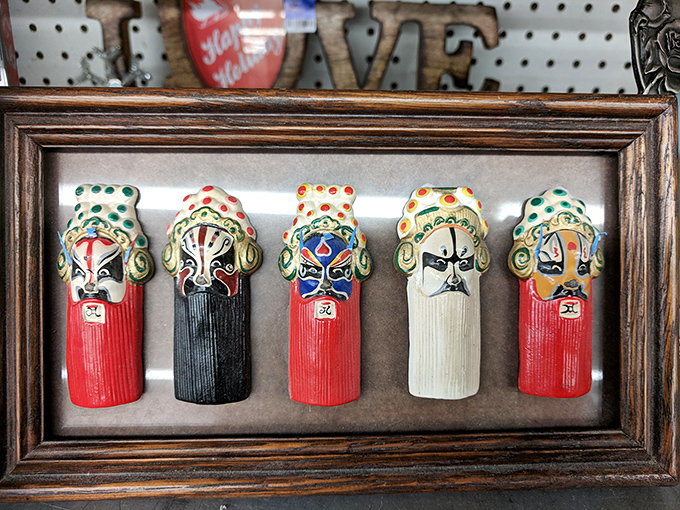 These traditional Chinese opera masks frame a cultural conversation piece. Perfect for the wall of someone who appreciates art with international flair.