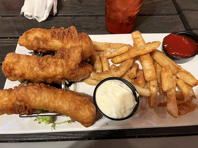 The fish and chips prove that sometimes the simplest pleasures are the most profound &ndash; golden-battered fish with a crispness that sings alongside perfectly fried potatoes.