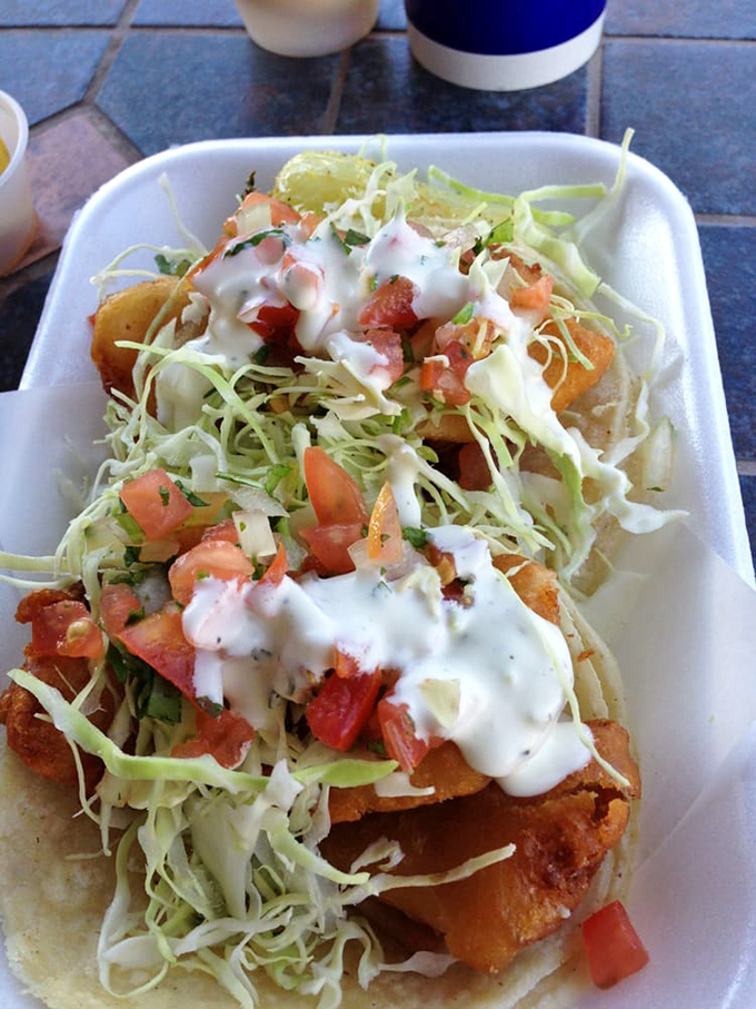 The legendary fish tacos that started it all - crispy, fresh, and perfectly balanced in every single bite.