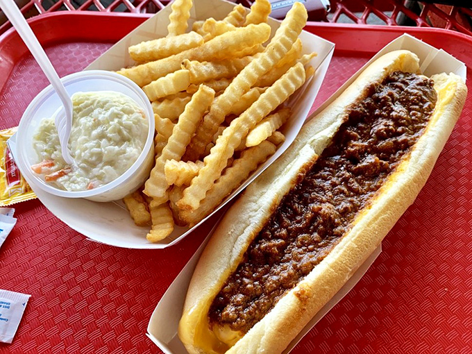 The coney dog and crinkle-cut fries – a dynamic duo that's been making car seats deliciously dangerous since before cup holders were invented.