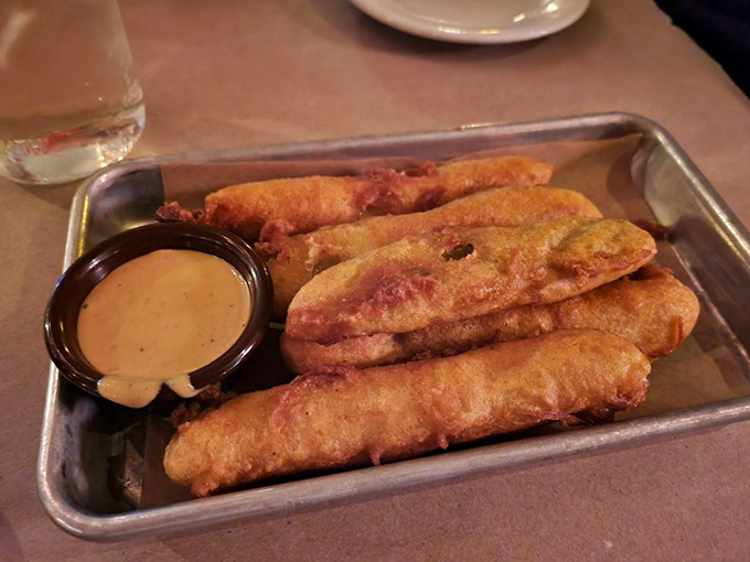 These aren't your garden-variety pickles&mdash;they're cucumber slices that went to finishing school, got a golden tan, and returned with a spicy attitude.