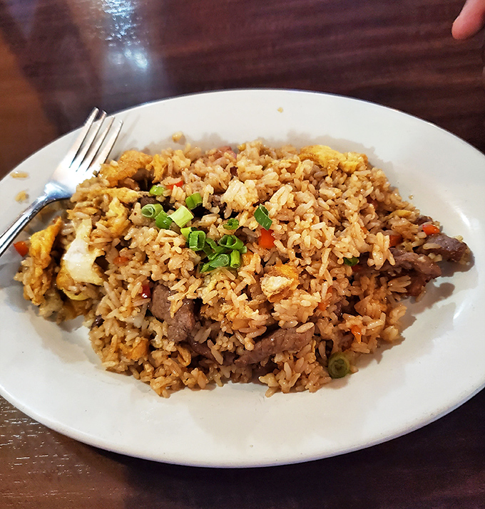 Not your takeout joint's fried rice! This Peruvian-style arroz chaufa marries wok-charred grains with tender morsels of meat in perfect harmony.