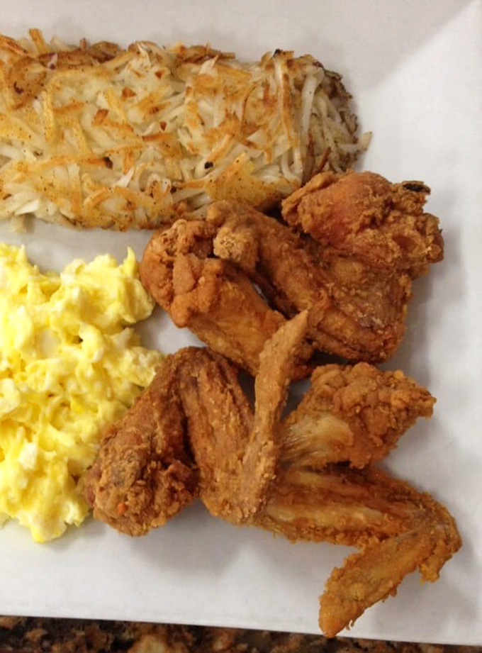 Fried chicken wings with that perfect crackle-crunch coating &ndash; the kind that makes conversation stop and eyes close in silent appreciation.