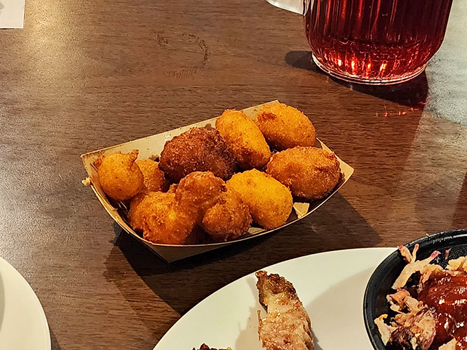 Hushpuppies: little golden orbs of cornmeal joy that make you wonder why bread gets all the attention at other restaurants.