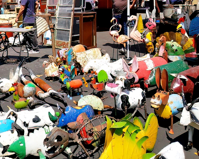 A menagerie of colorful yard art animals stands at attention&mdash;like a carnival that escaped and froze in time, waiting for new backyard homes.
