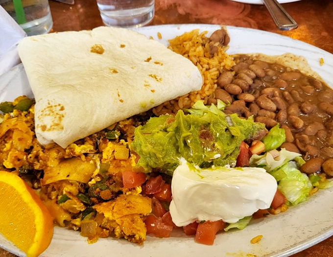 Breakfast goes on a southwestern vacation with this colorful plate that's like sunshine arranged artfully with beans, tortillas, and all the fixings.