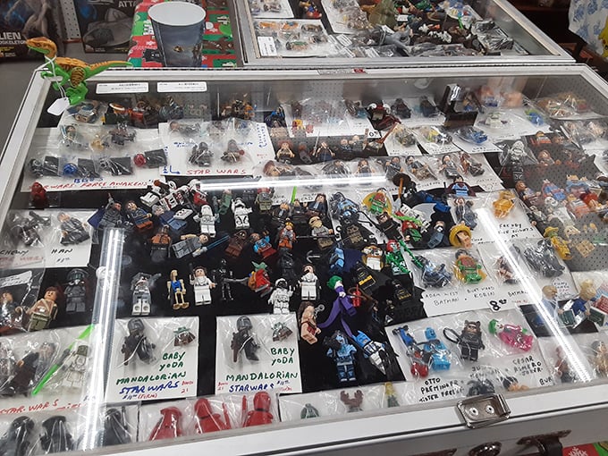 A galaxy of collectible figures in one display case. From Star Wars to superheroes, these tiny treasures represent big childhood memories for collectors of all ages.