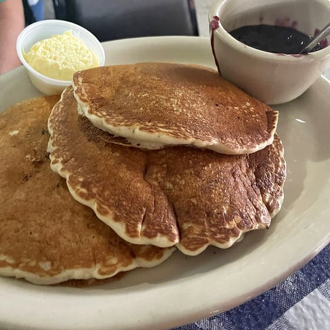 Pancakes so perfectly golden they belong in a museum, but they're much better on your plate with that pat of butter slowly melting.