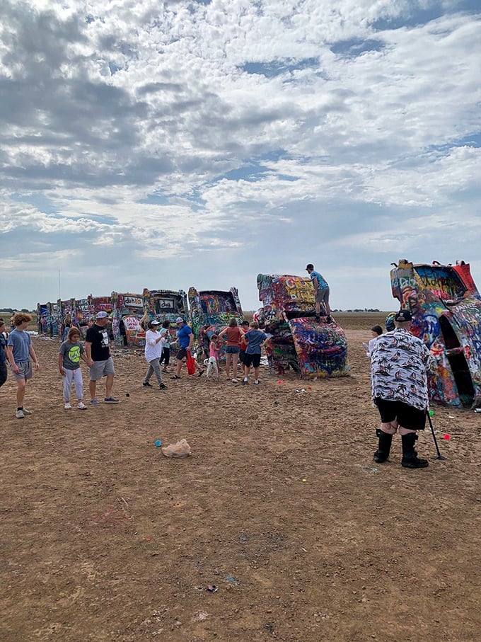 Under dramatic Texas skies, strangers become temporary collaborators in this democratic art experiment. Everyone's an artist at Cadillac Ranch.