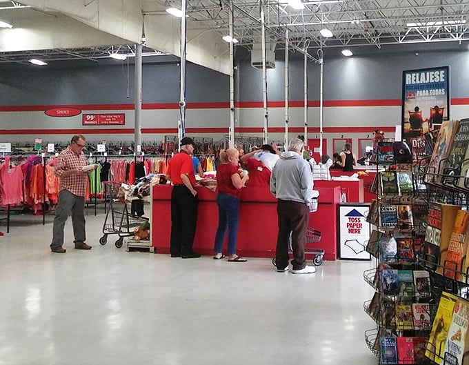 The checkout line buzzes with the quiet excitement of successful hunters, carts filled with discoveries that will soon become "Can you believe I only paid..."