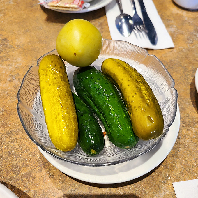 The pickle plate &ndash; where cucumbers go to fulfill their destiny. Crunchy, garlicky, and the perfect counterpoint to those massive sandwiches.