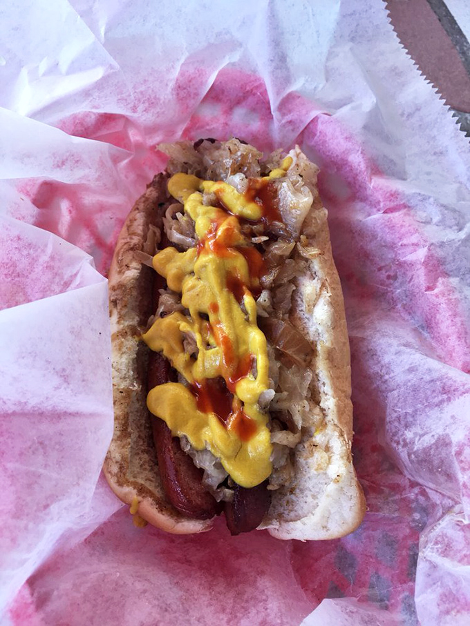 When mustard and onions meet a perfectly grilled dog, magic happens. This isn't fast food; it's food made with haste and care.