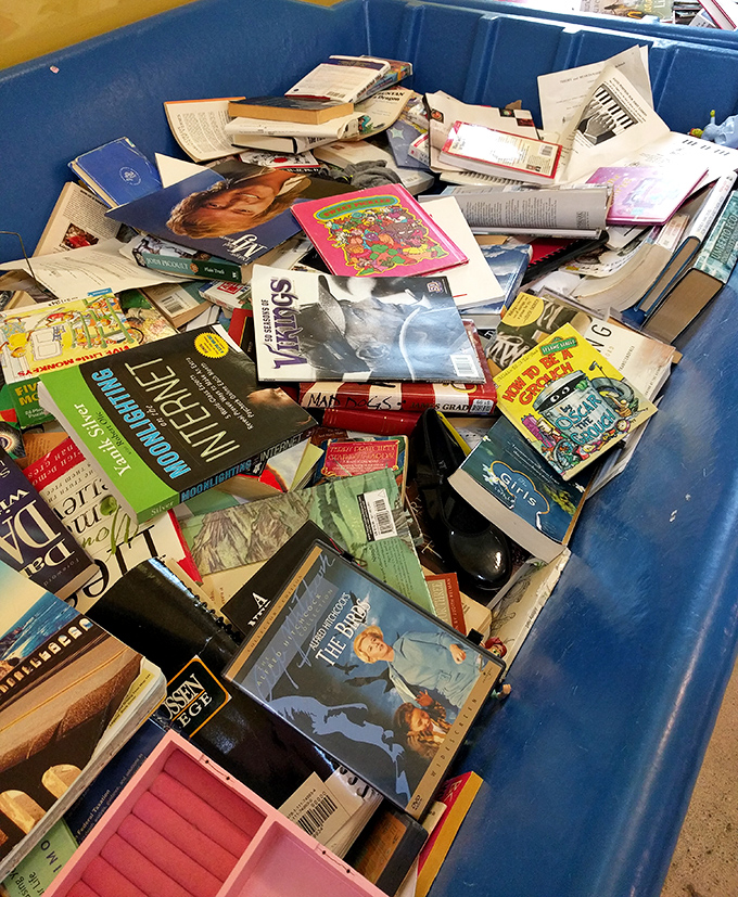 Literary treasure trove where paperbacks pile high like a reader's fever dream &ndash; someone else's finished novel is your next adventure.