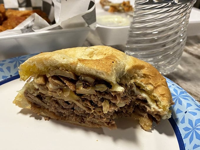 A sandwich that requires both hands and possibly a nap afterward. The prime rib isn't just tender&mdash;it practically surrenders at the sight of your fork.