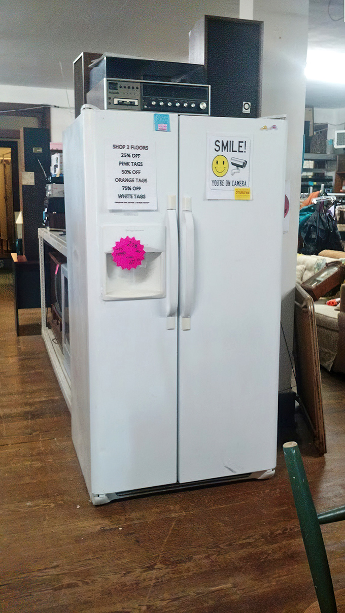 Not just a refrigerator, but a portal to bargain heaven. The color-coded tag system is the secret language of serious thrifters everywhere